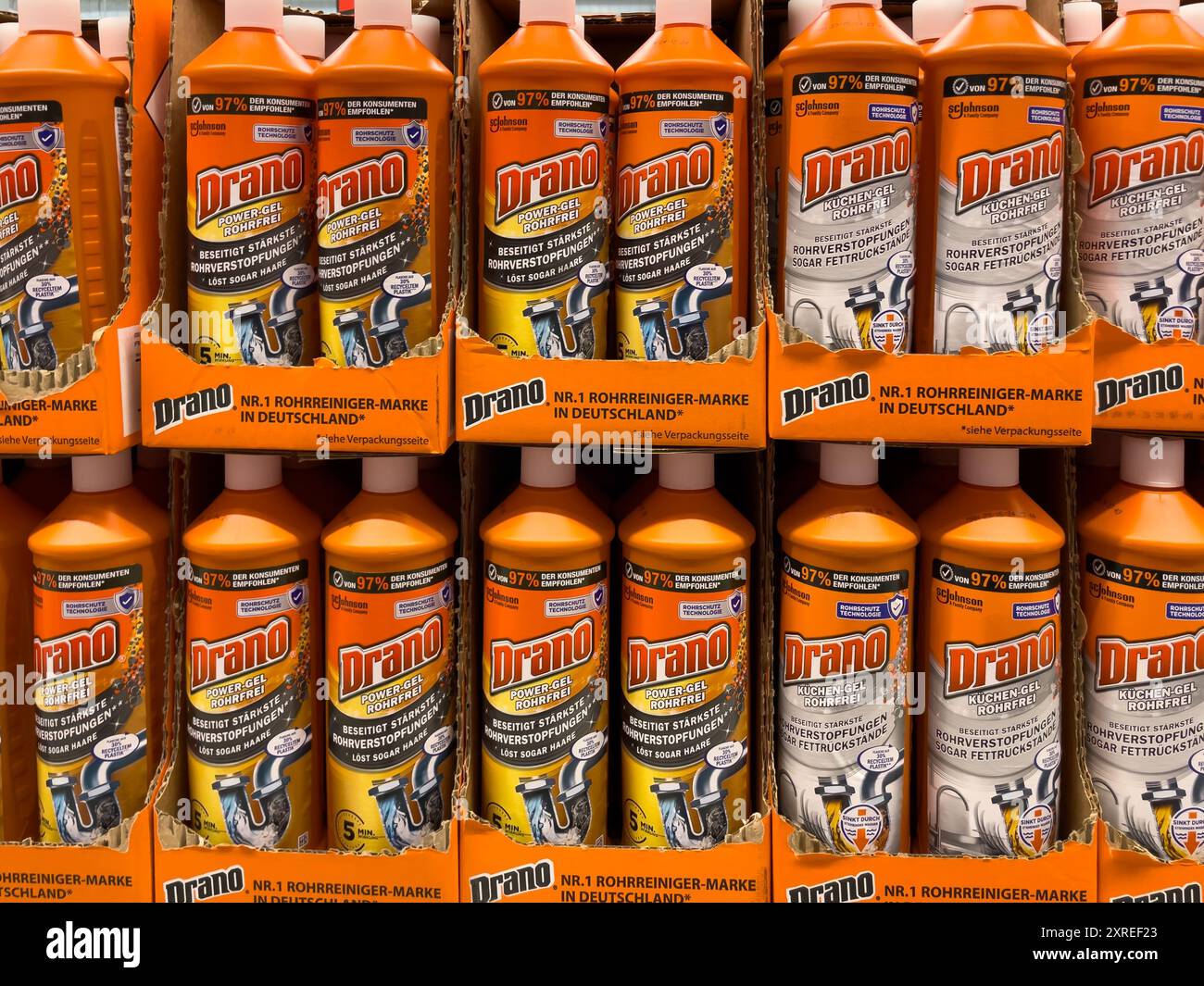 On the display are a row of orange bottles of Drano drain cleaner. The ...