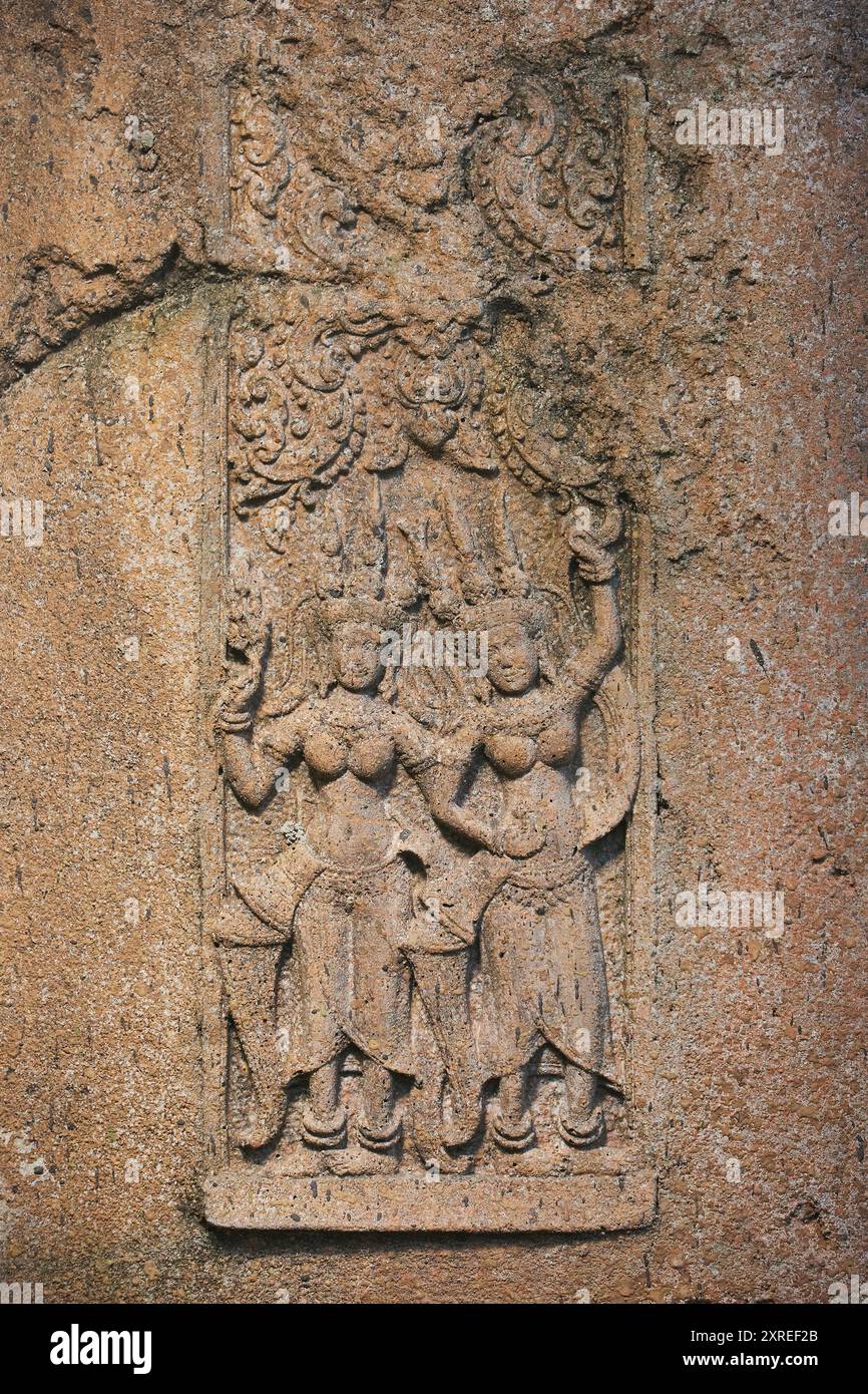 Decorative engraving of ancient tribes on a rock in the Danish zoo ...