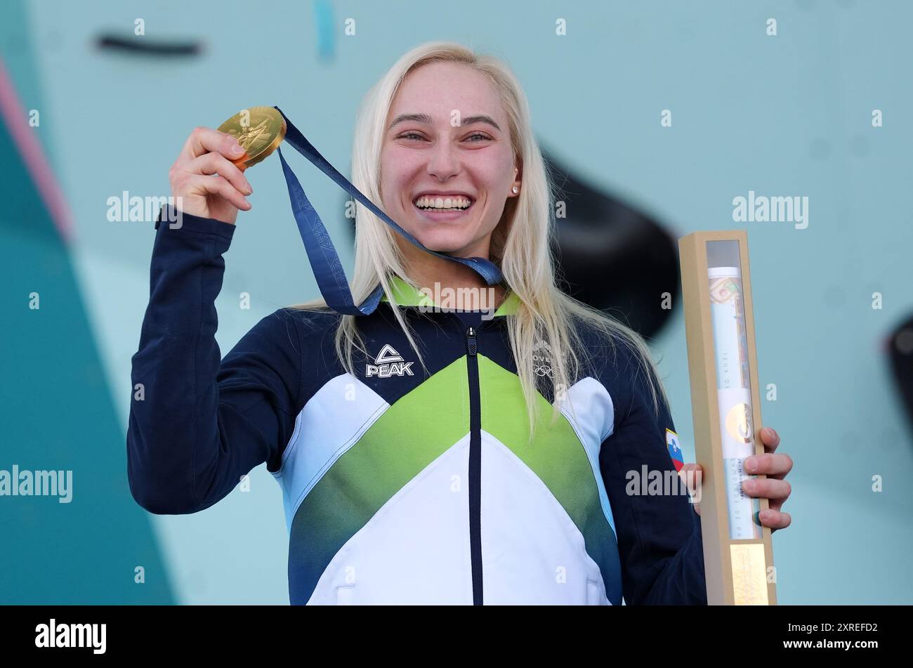 Slovenia's Janja Garnbret with her gold medal for the Women's Boulder ...