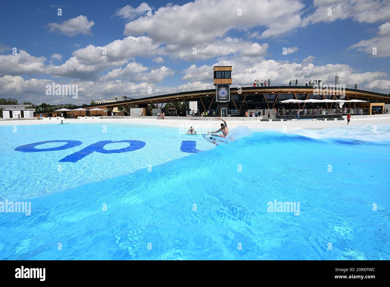 Hallbergmoos, Germany. 10th Aug, 2024. A surfer surfs at the opening of ...