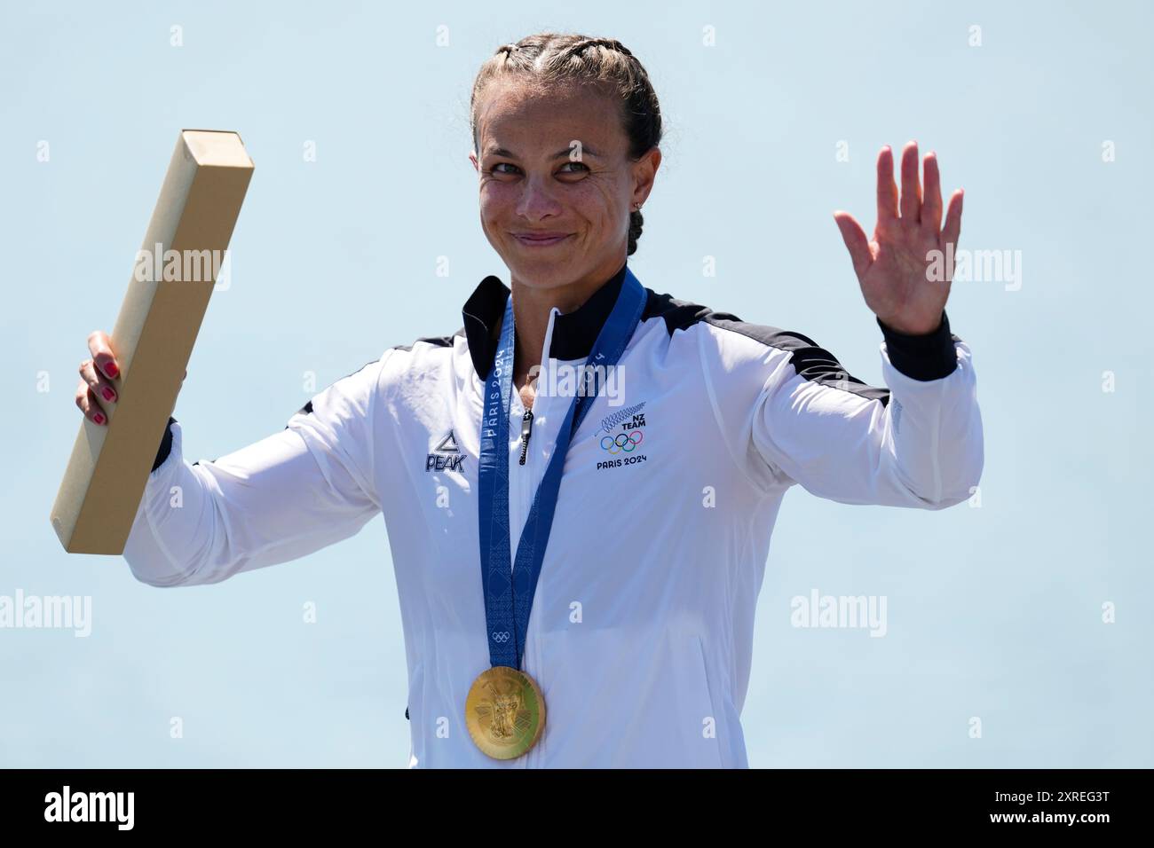 Gold medalist Aimee Fisher, of New Zealand, poses during a medals ...