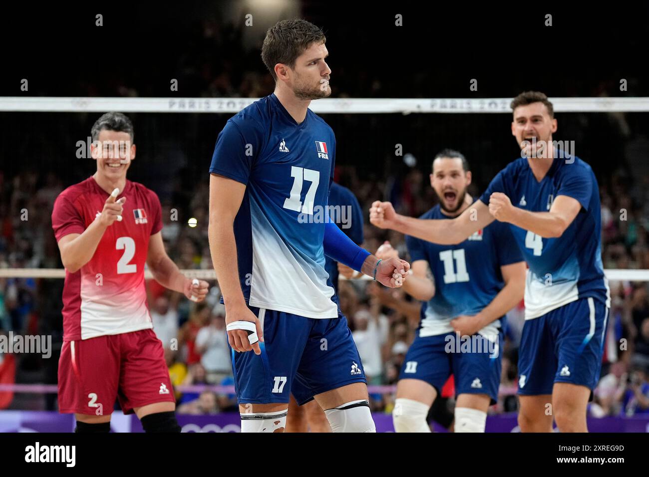French players celebrate after winning the second set during a gold ...