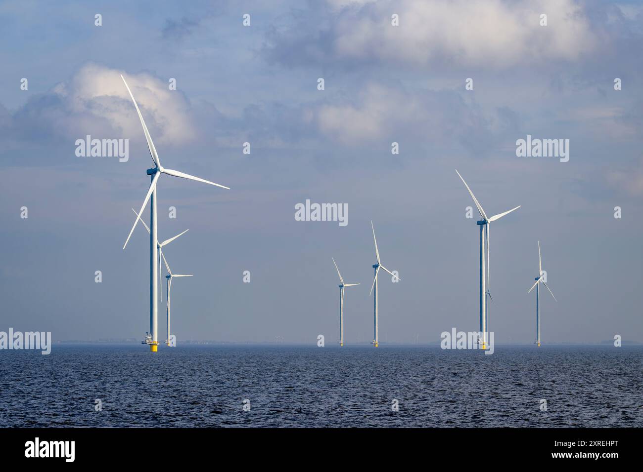 Modern windmills for renewable energy at sea near the afsluitdijk ...