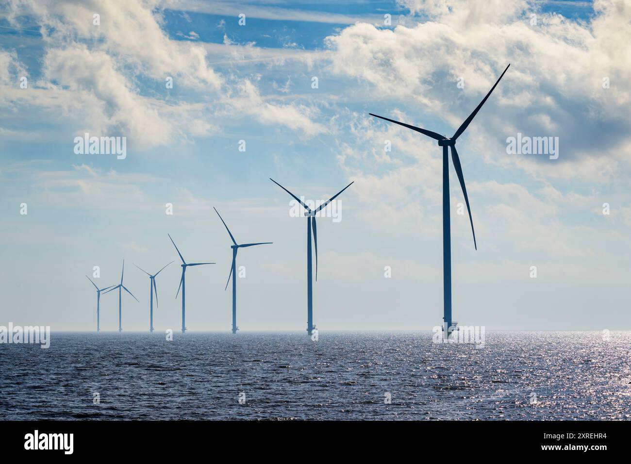 Modern windmills for renewable energy at sea near the afsluitdijk ...