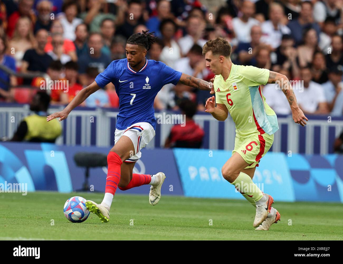 PARIS, FRANCE - AUGUST 09: Michael Olise of of Team France vies with ...