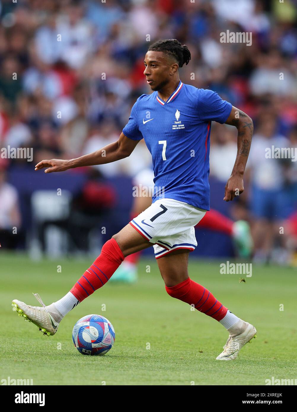 PARIS, FRANCE - AUGUST 09: Michael Olise of of Team France runs with a ...