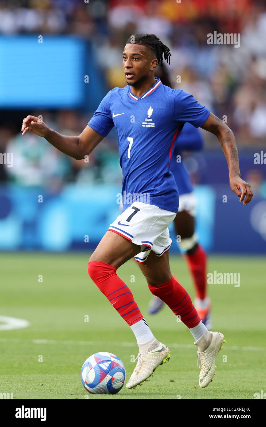 PARIS, FRANCE - AUGUST 09: Michael Olise of of Team France runs with a ...