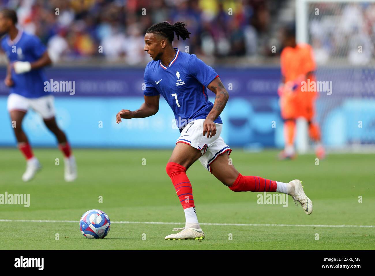 PARIS, FRANCE - AUGUST 09: Michael Olise of of Team France runs with a ...