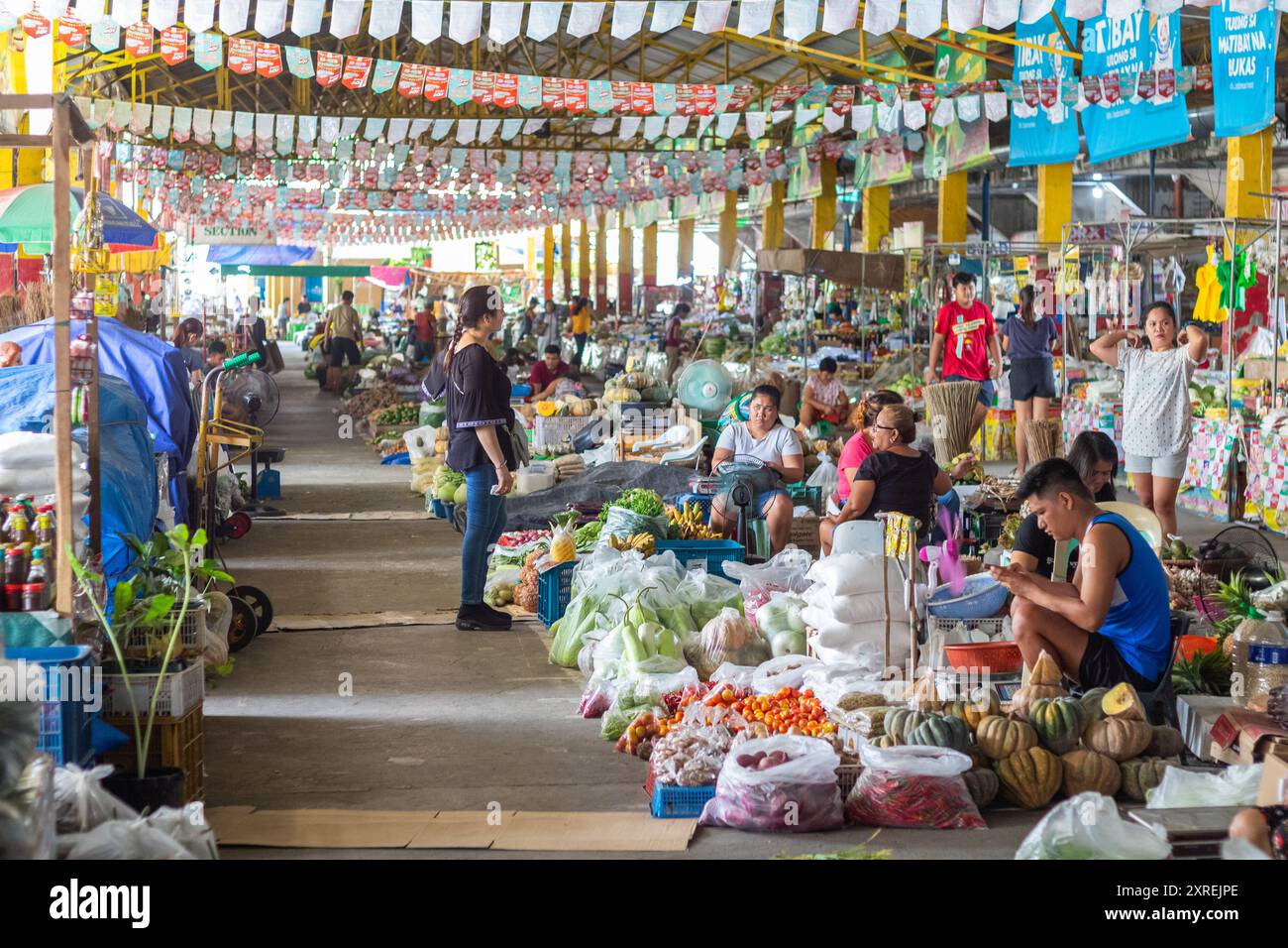 A typical Philippine market mostly selling vegetables in Ilocos Stock ...