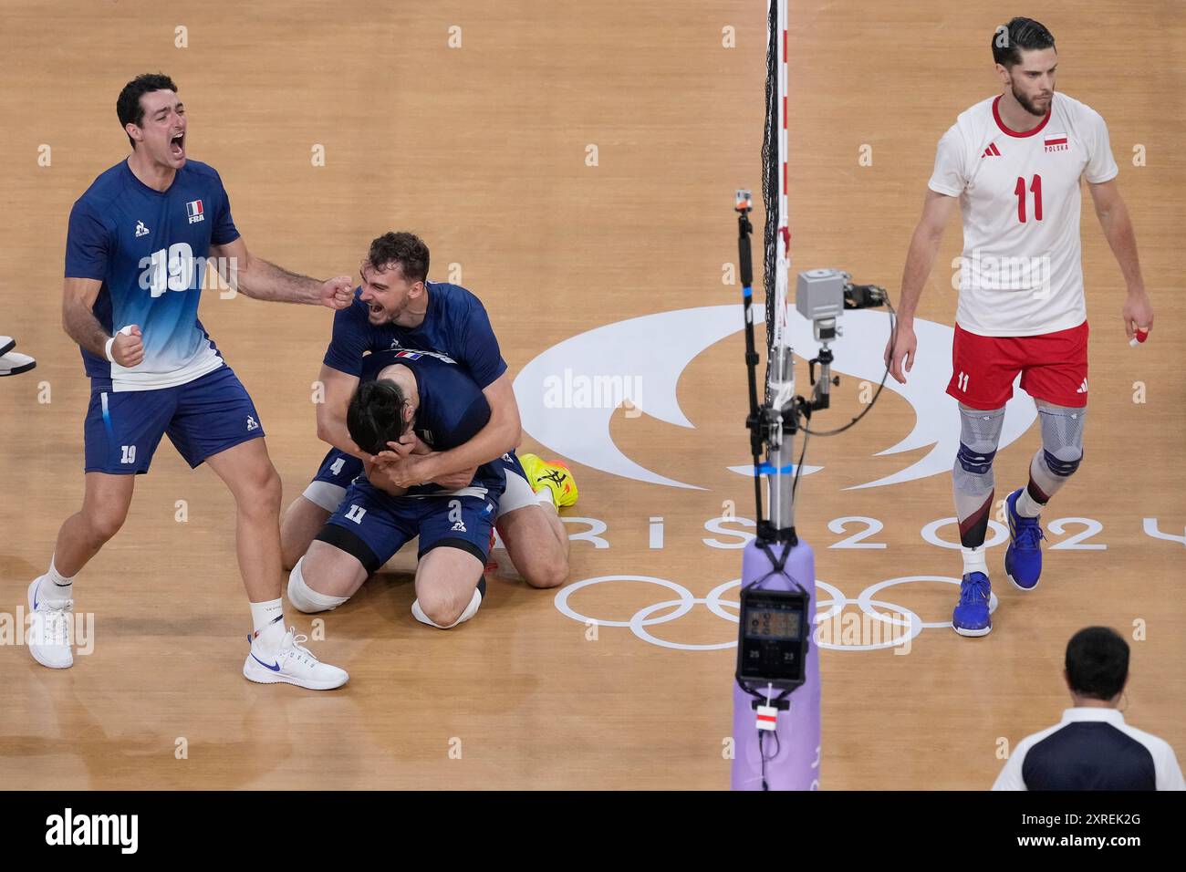 French players celebrate after winning a gold medal men's volleyball ...