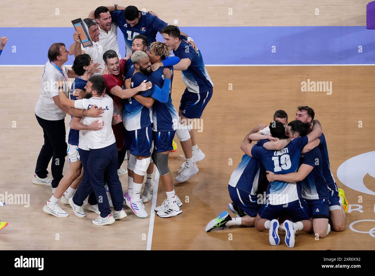 French players celebrate after winning a gold medal men's volleyball ...