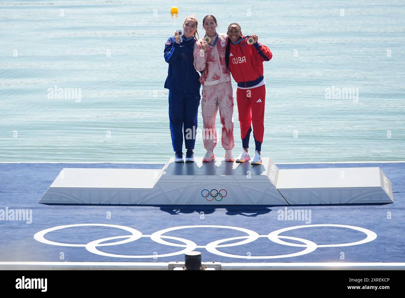 Silver medalist Nevin Harrison, of the United States, from left, gold ...