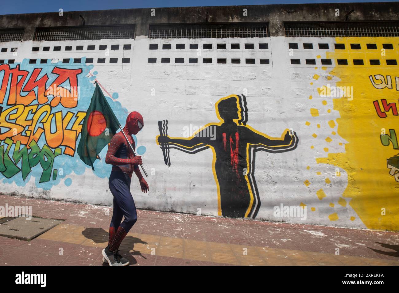 Dhaka, Bangladesh. 09th Aug, 2024. A man wearing a Spider-Man costume ...