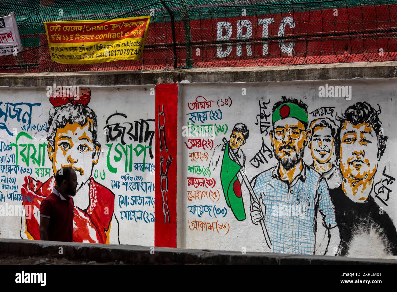 Dhaka, Bangladesh. 09th Aug, 2024. A man walk past a wall with graffiti ...