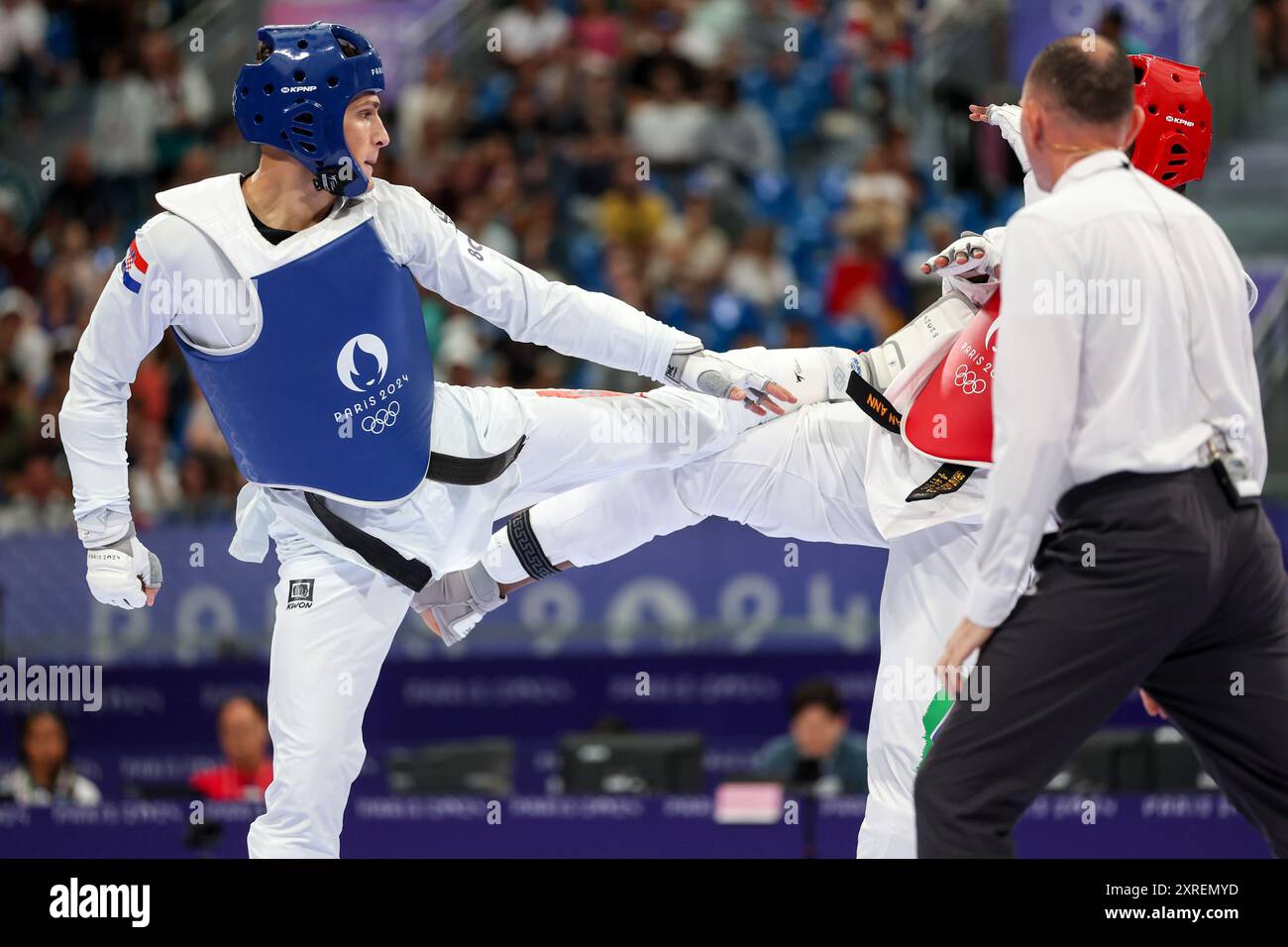 Paris, France. 10th Aug, 2024. Ivan Sapina of Croatia (blue) and Alasan ...