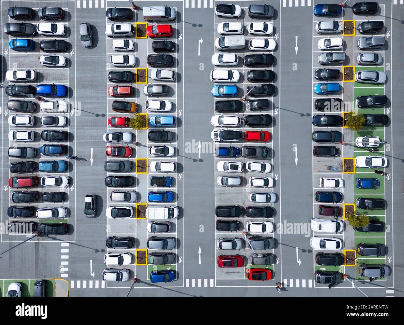 Aerial view of many cars in busy car park at large shopping mall ...