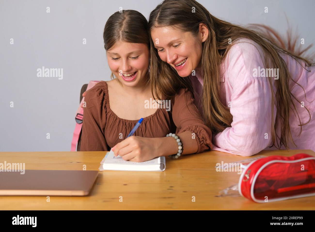 School kid at home teenager helping hi-res stock photography and images ...