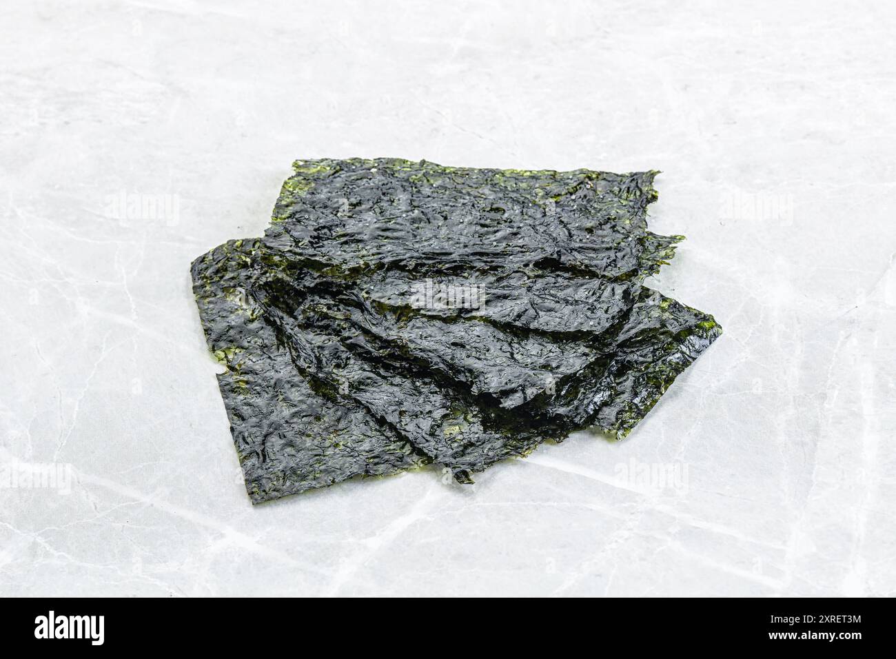 Korean nori seaweed chips heap snack Stock Photo - Alamy