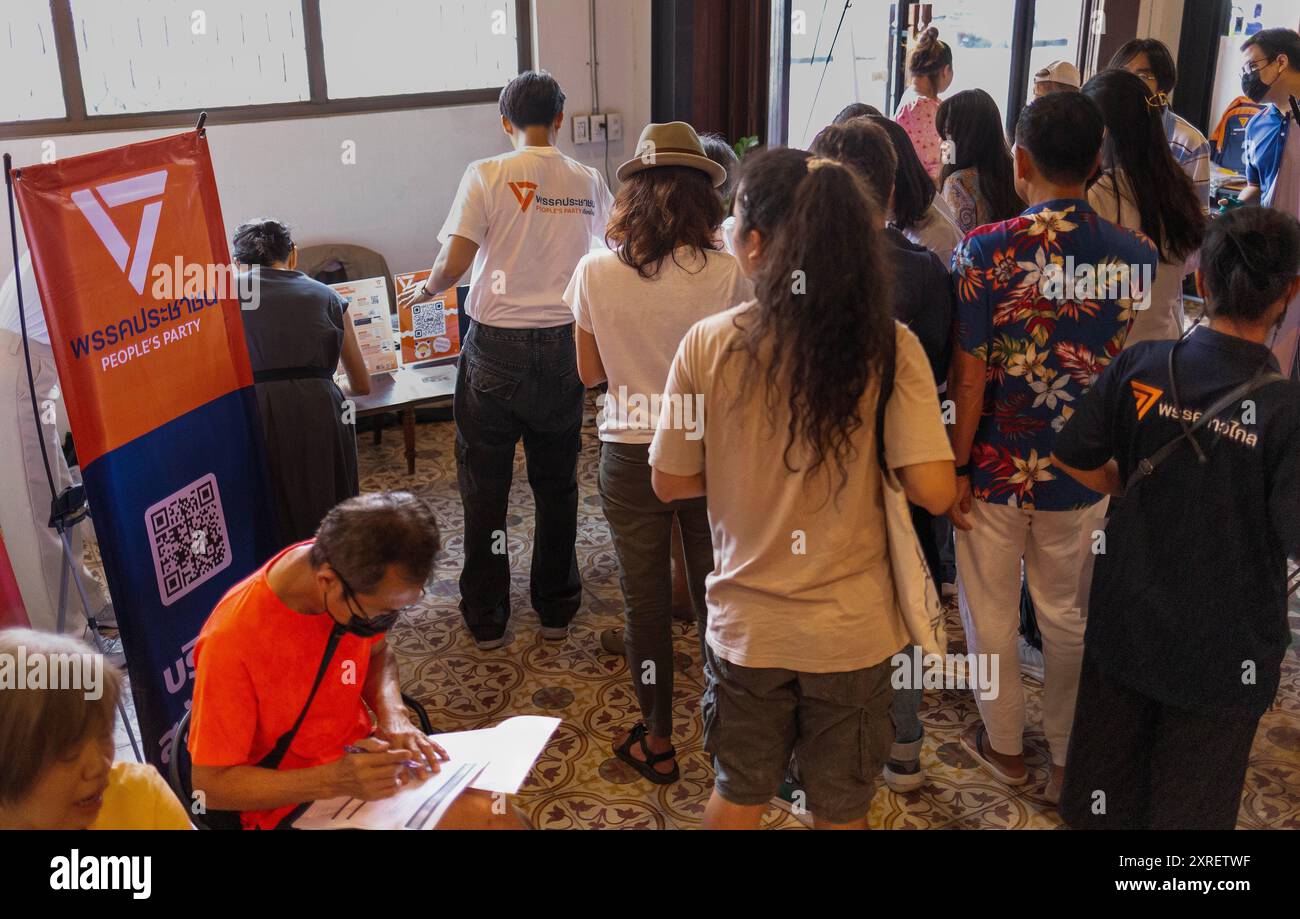 Supporters of the People's Party register for membership at a ...