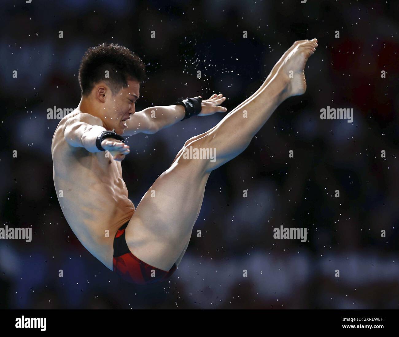 Japan's Rikuto Tamai competes in the men's 10-meter platform diving ...