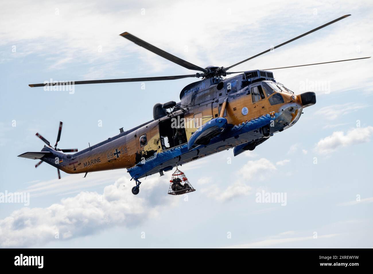 10 August 2024, Mecklenburg-Western Pomerania, Rostock-Warnemünde: A Sea King Mk41 SAR ...