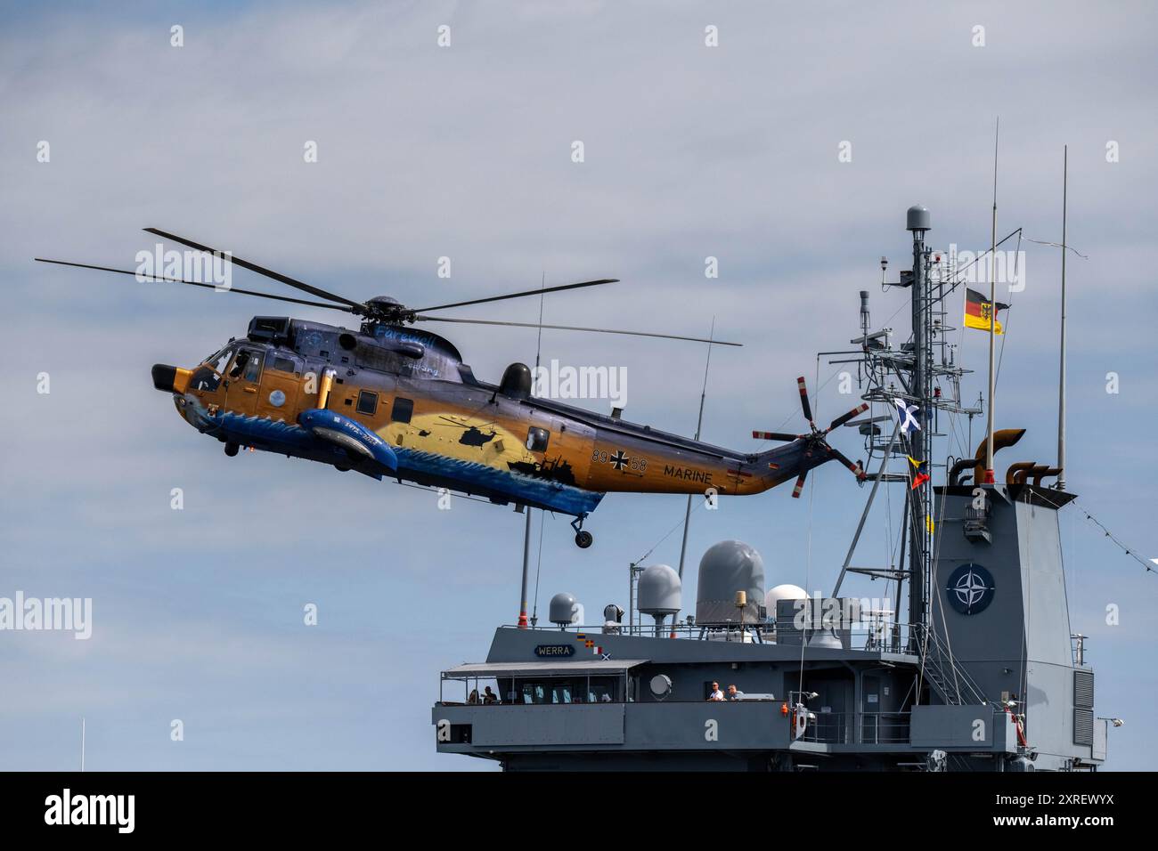 10 August 2024, Mecklenburg-Western Pomerania, Rostock-Warnemünde: A Sea King Mk41 SAR ...
