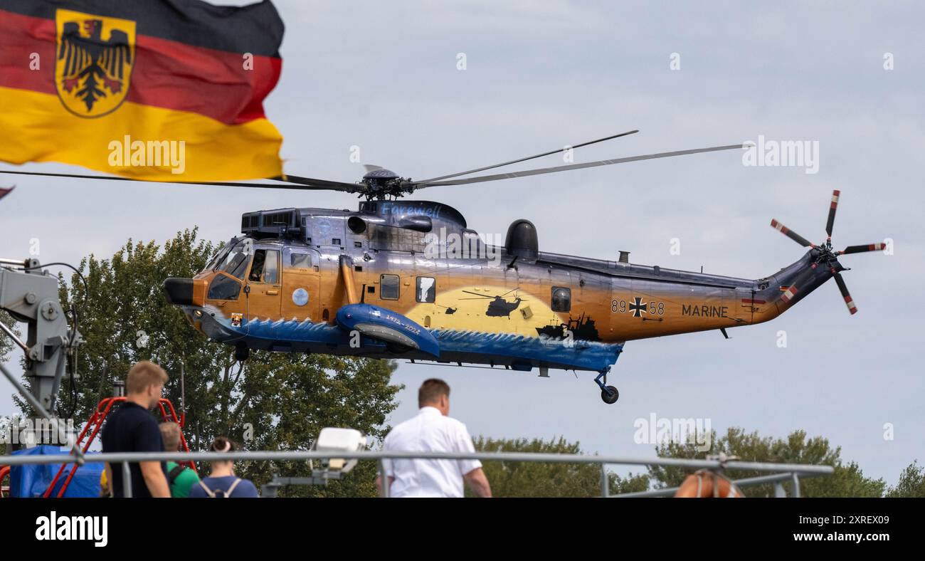 10 August 2024, Mecklenburg-Western Pomerania, Rostock-Warnemünde: A Sea King Mk41 SAR ...