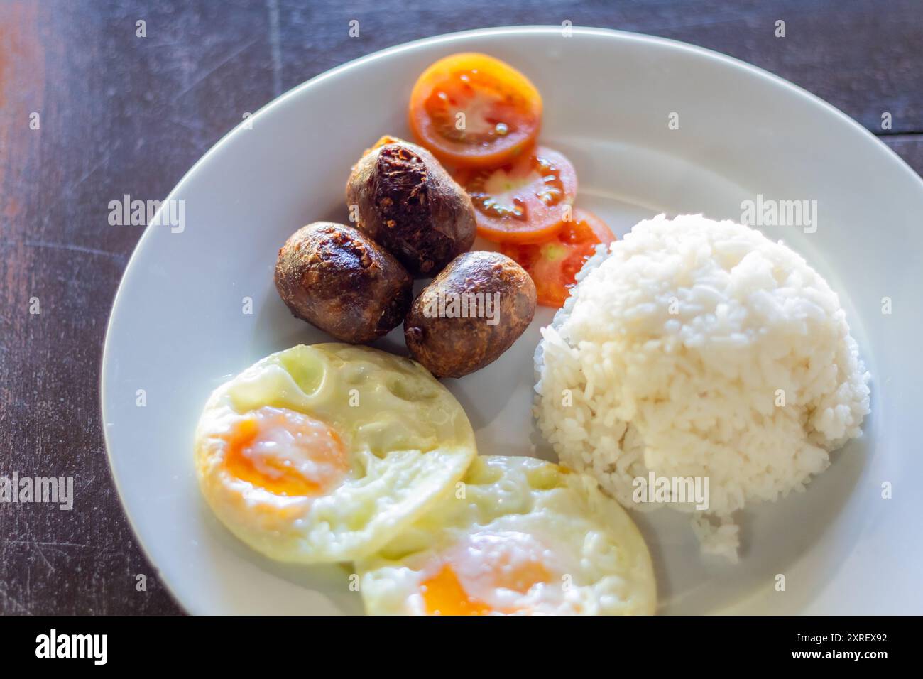 Longsilog, a traditional Filipino breakfast in Ilocos Norte ...