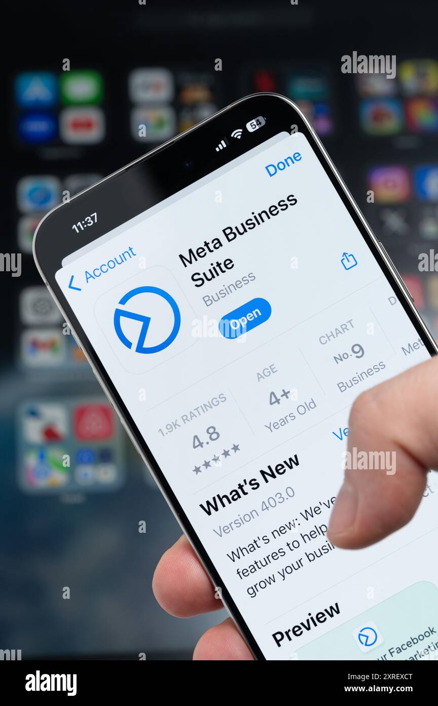 New York, USA - August 5, 2024: Smartphone in hand with Meta Business Suite app on screen macro ...