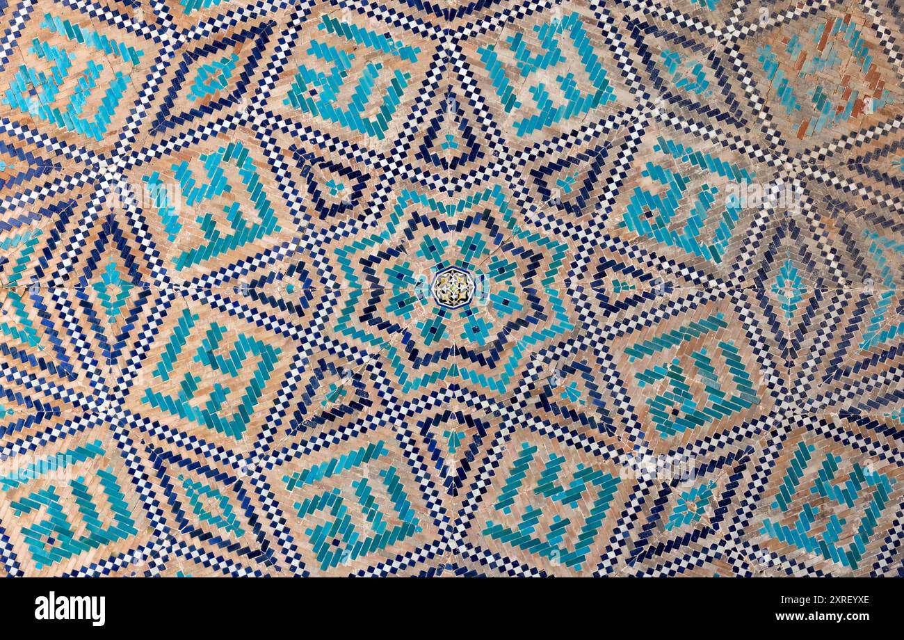 traditional Uzbek pattern on the ceramic tile on the wall of the mosque ...