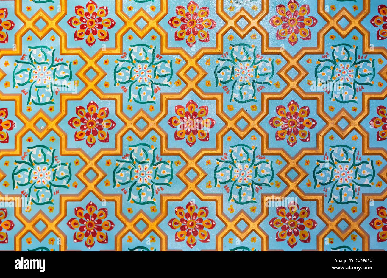 traditional Uzbek pattern on the ceramic tile on the wall of the mosque ...