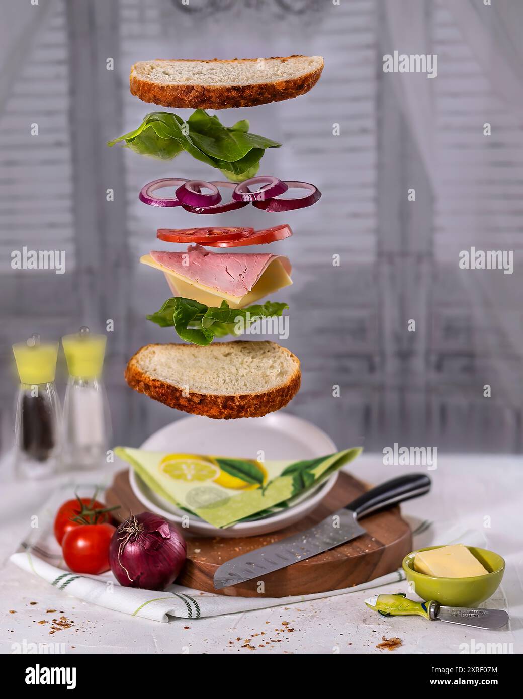 Conceptual photography of deconstructed ham sandwich Stock Photo - Alamy