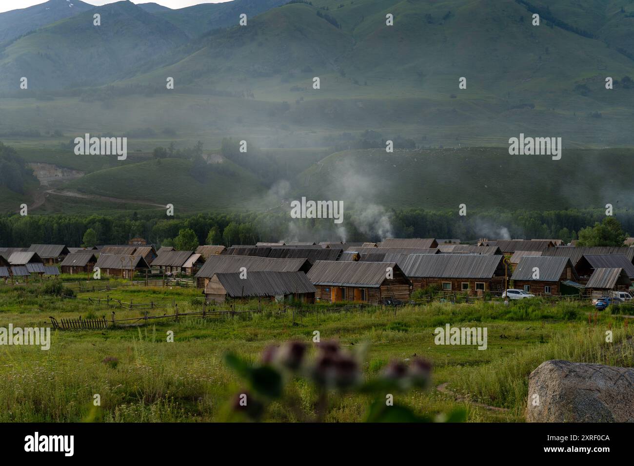 Morning Mist Over Xinjiang Homes Stock Photo - Alamy