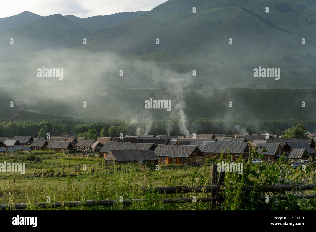 Morning Mist Over Xinjiang Homes Stock Photo - Alamy