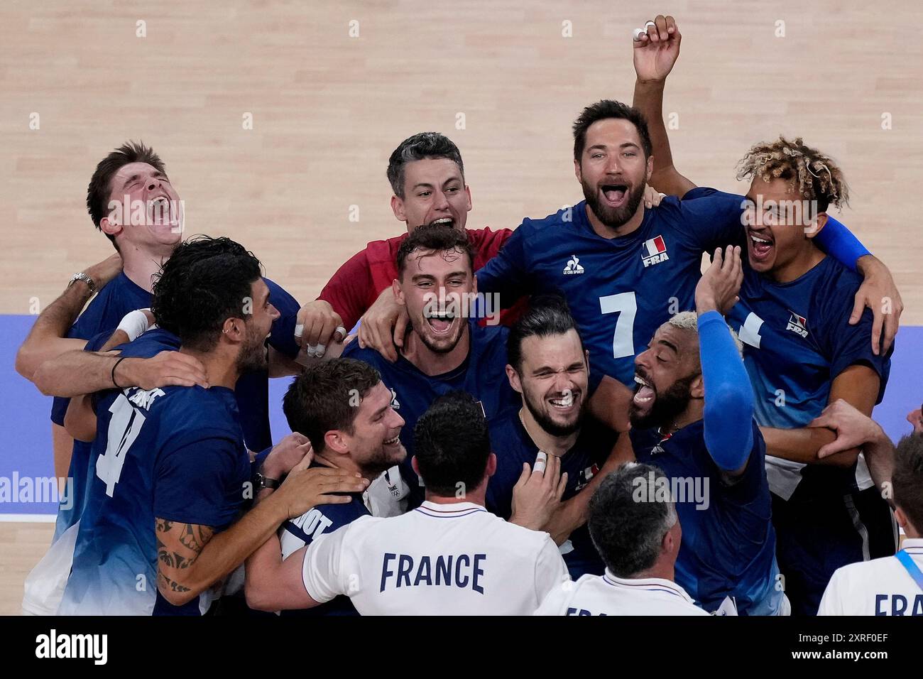 French players celebrate after winning a gold medal men's volleyball ...