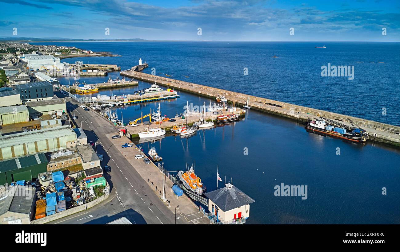 Buckie Harbour Moray Firth in summer the piers and quays with moored ...