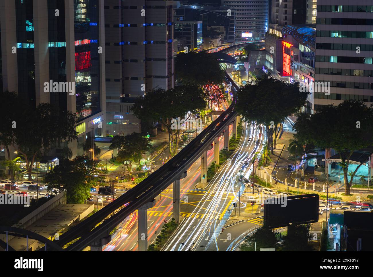 A picture of the Kuala Lumpur traffic at night, depicting the monorail ...