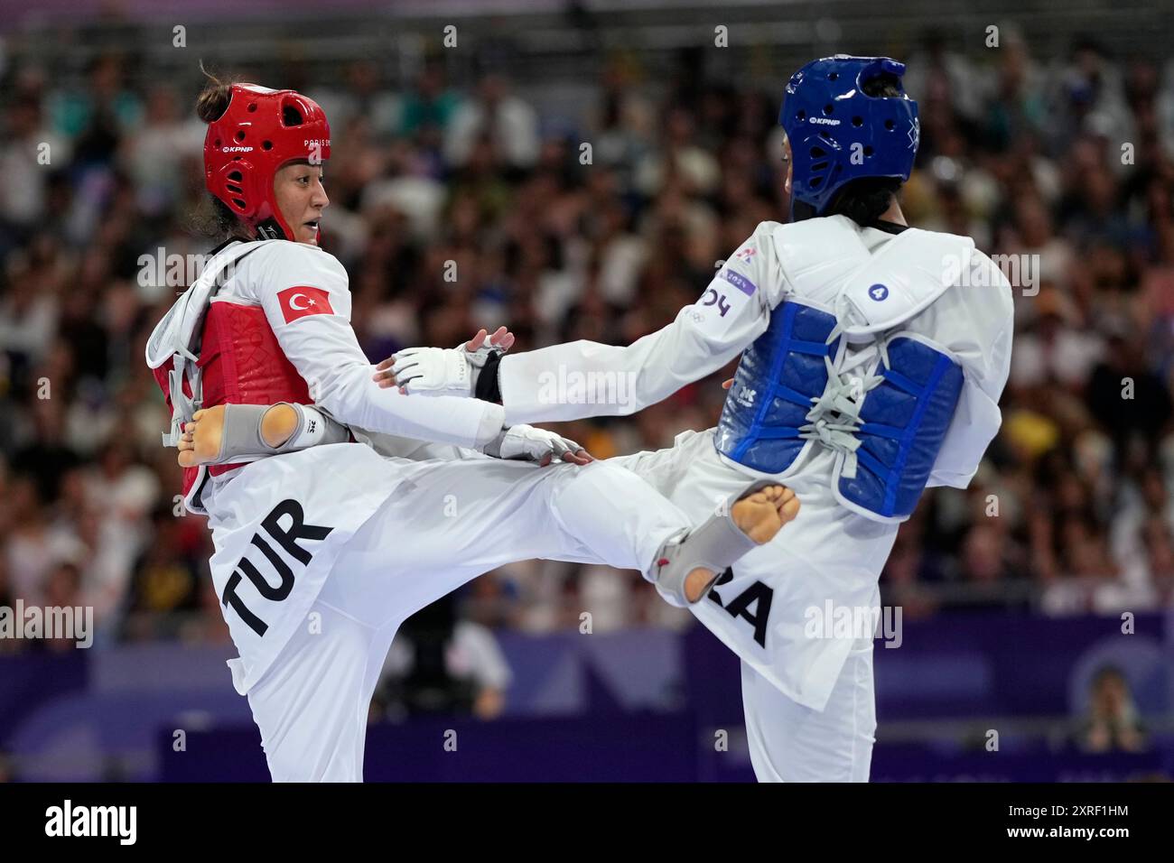 France's Althea Laurin competes with Turkey's Nafia Kus Aydin in a ...