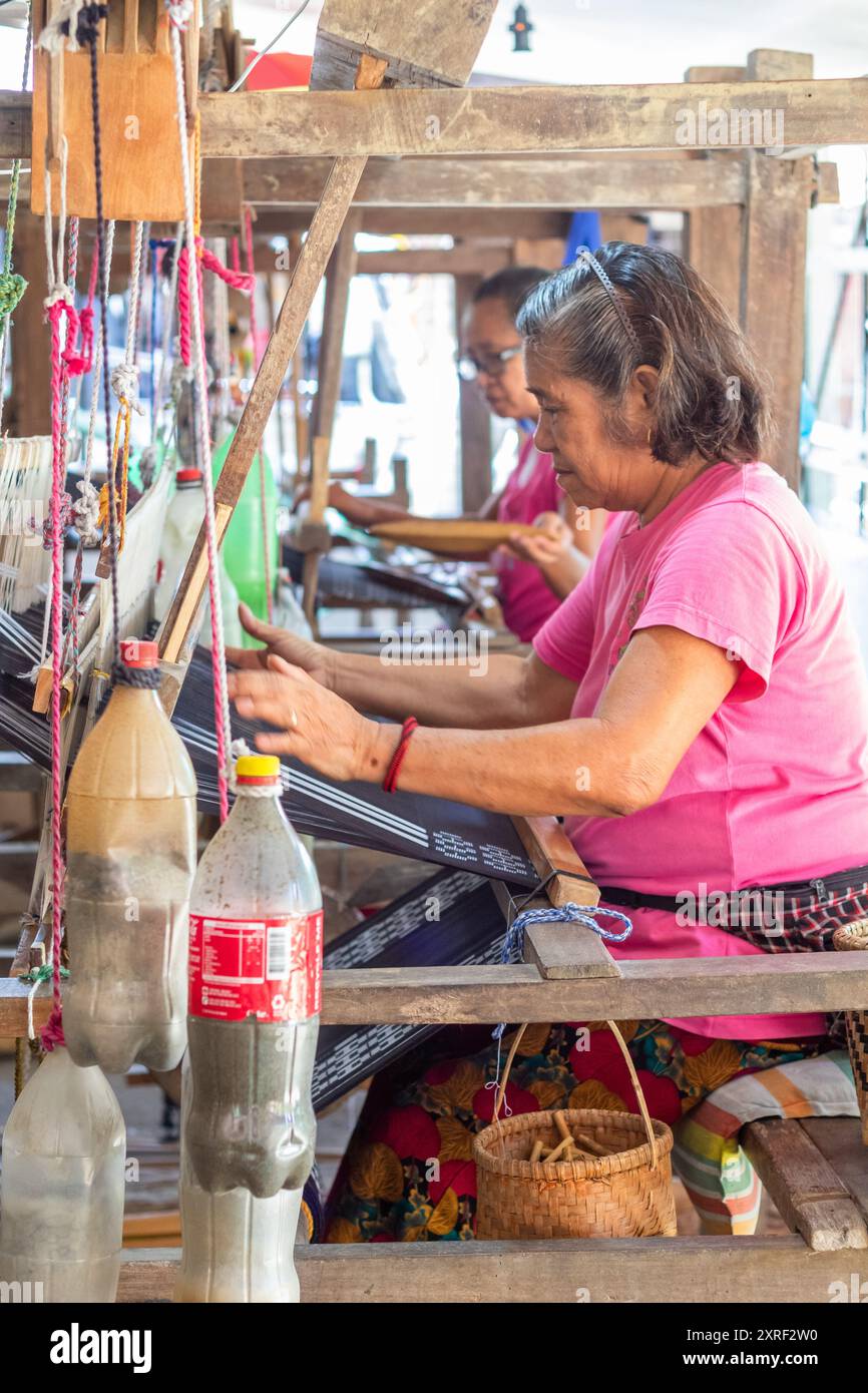 An inabel hand loom weaver at the Gamaba center in Pinili, Ilocos Norte ...