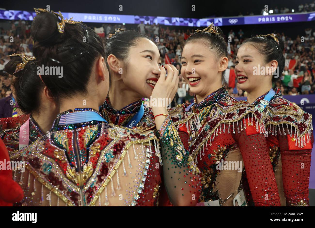 Paris, France. 10th Aug, 2024. Athletes of Team China react after the ...