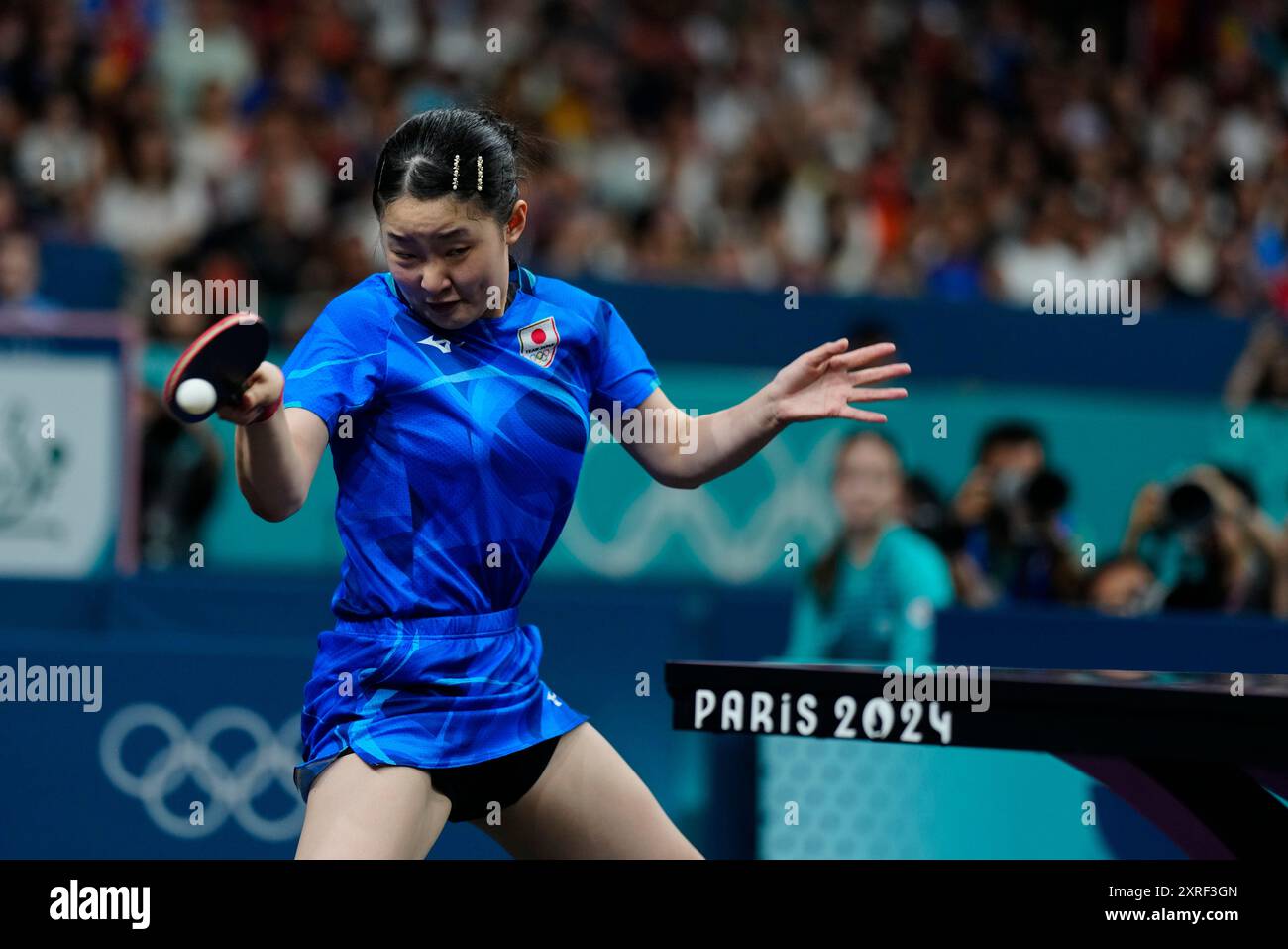 Japan's Miwa Harimoto plays against China's Wang Manyu during the women ...