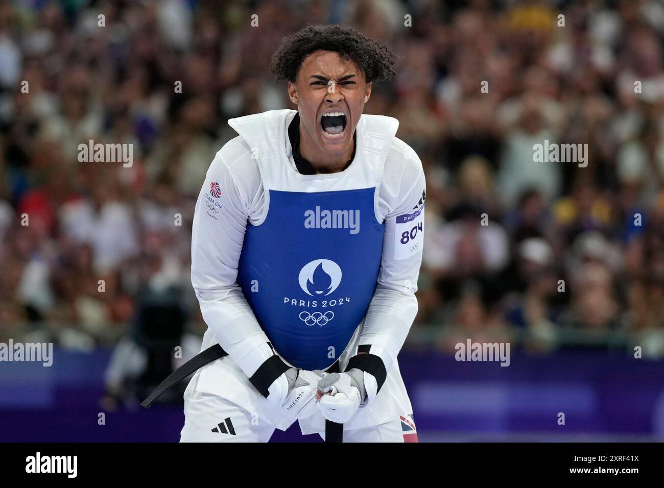 Britain's Caden Cunningham celebrates after winning the men's over 80kg ...