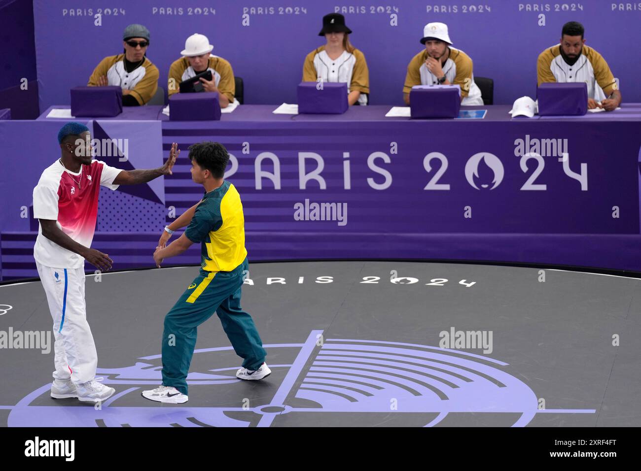 France's Danis Civil, known as B-Boy Dany Dann, left, and Australia's ...