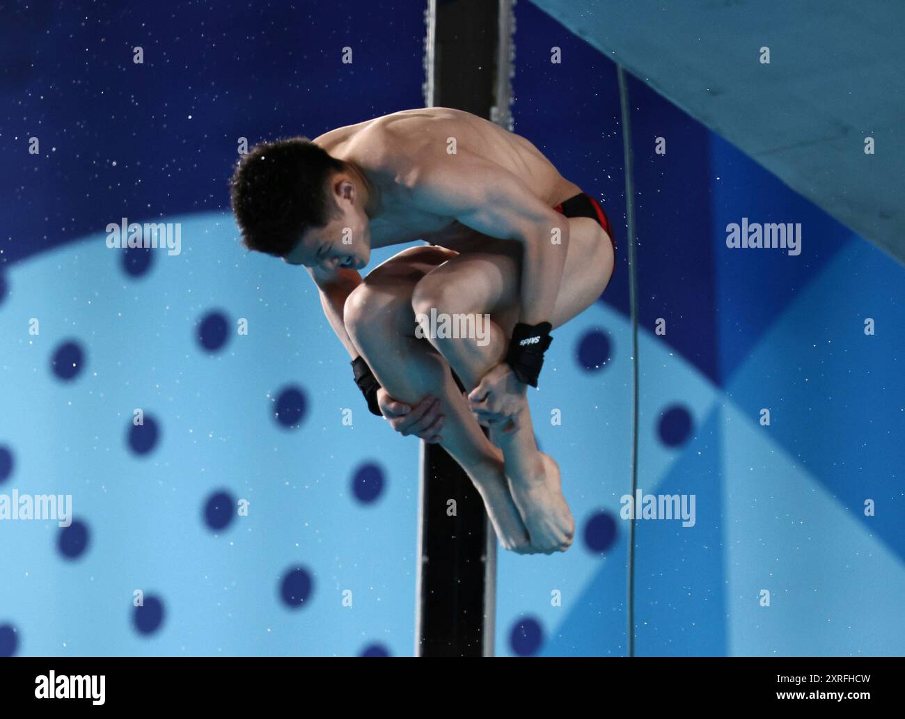Japan's Tamai Rikuto competes during Diving- the men's 10m platform at ...