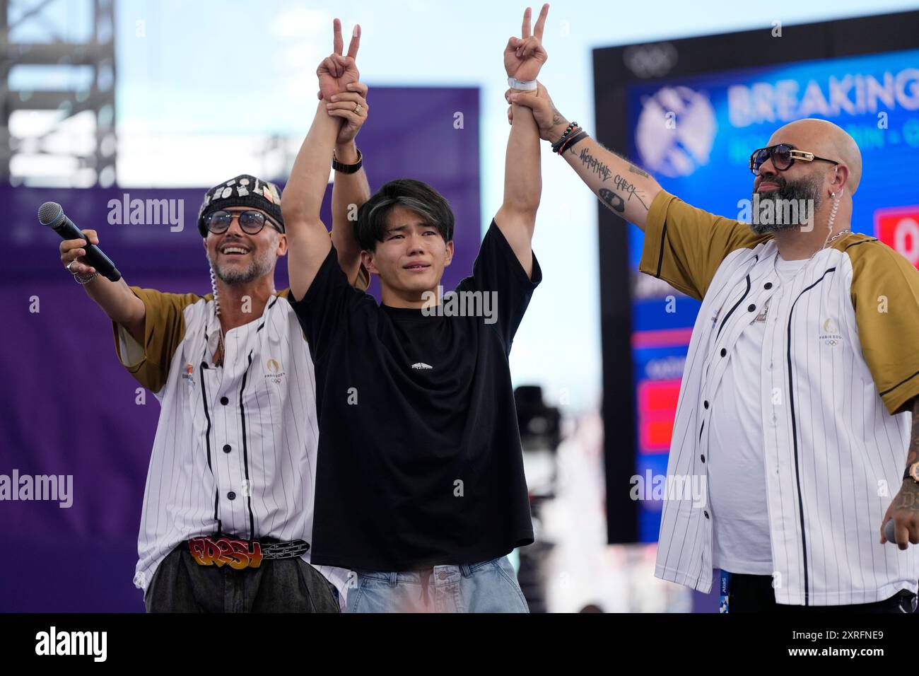 Japan's Hiroto Ono, known as B-Boy Hiro10, center reacts after competing during the B-Boys round ...