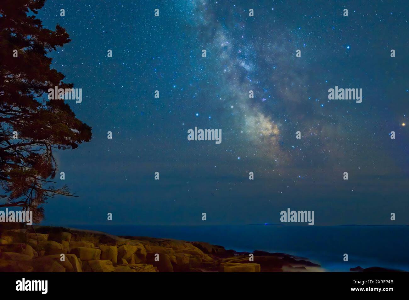 The Milky Way Makes An Appearance In the Maine Night Sky Stock Photo ...