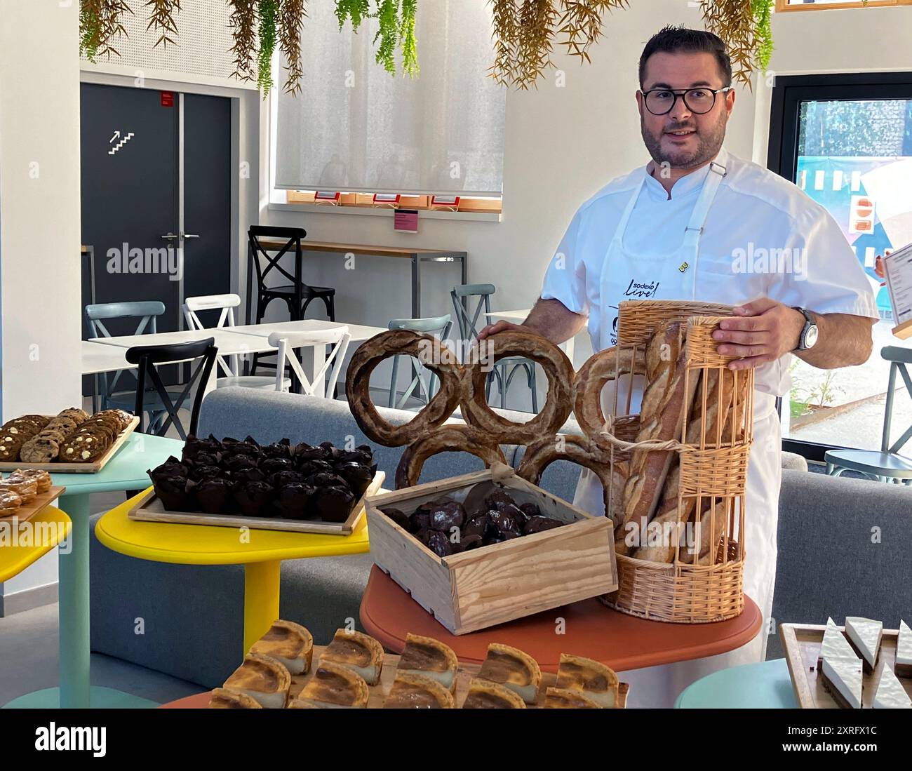 Tony Doré, chief baker at the Olympic village poses for a photo, during ...
