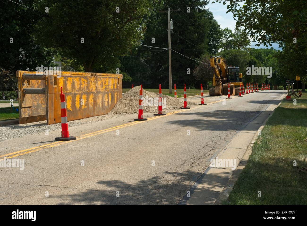 A trench box and excavatir for water line replacement work on a city ...