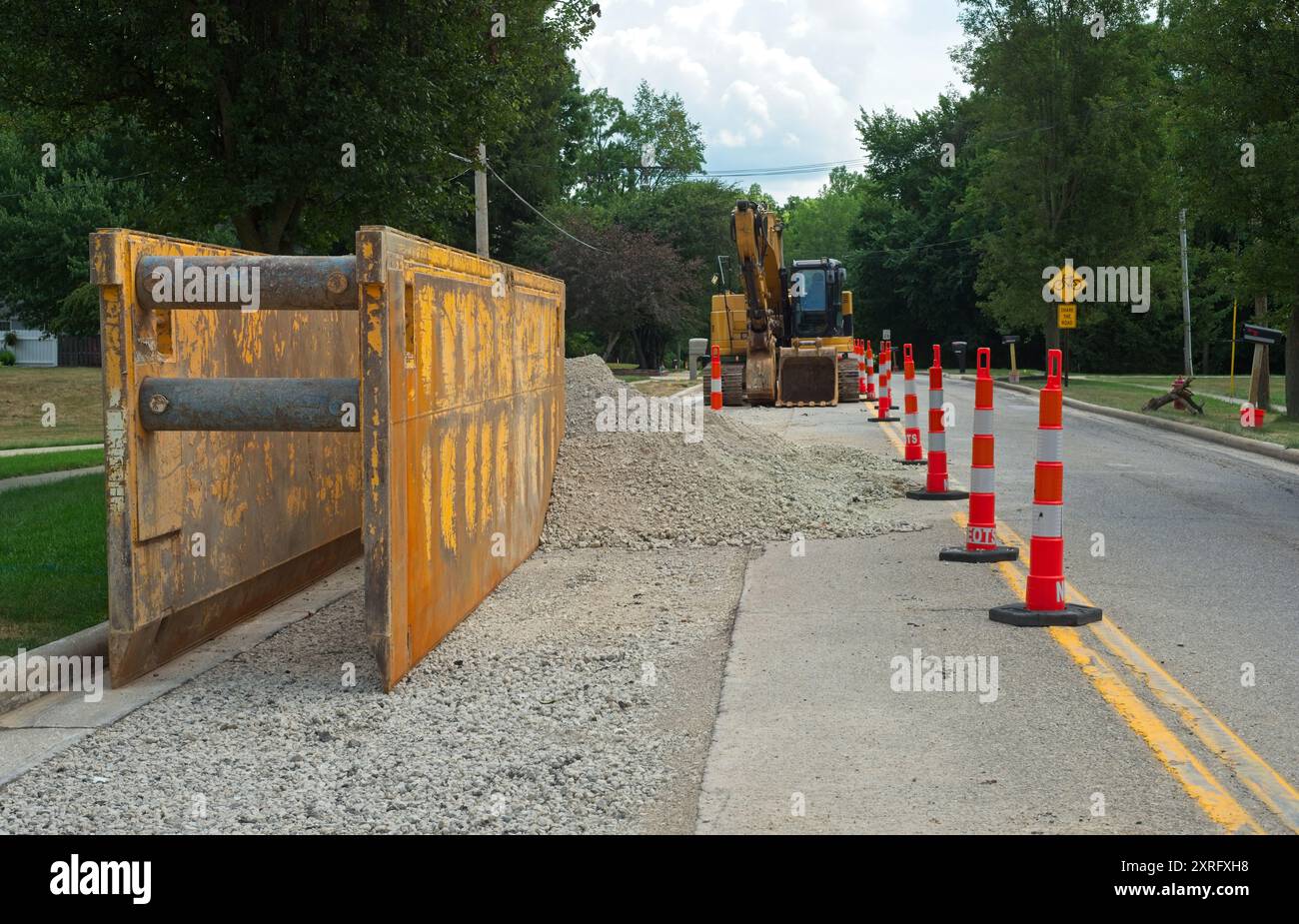 A trench box for laying pipe in a water line replacement and excavator ...