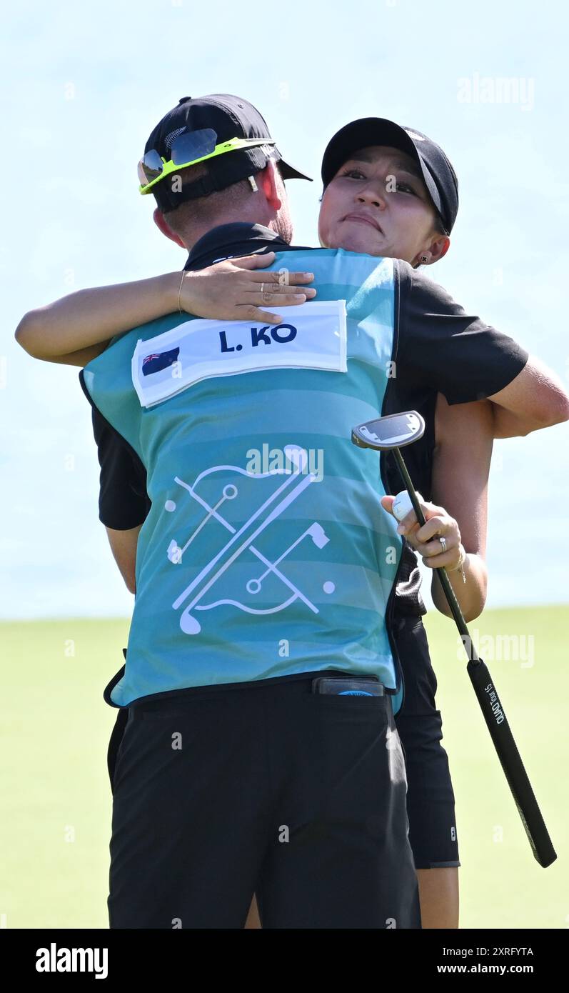KO Lydia of New Zealand is celebrated after winning the golf women's ...